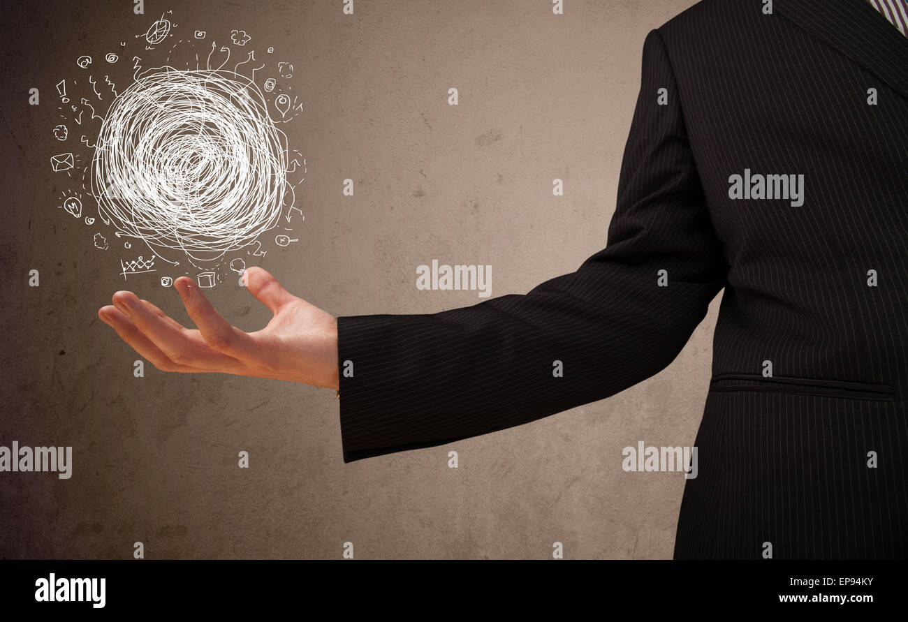 Chaos concept in the hand of a businessman Stock Photo - Alamy