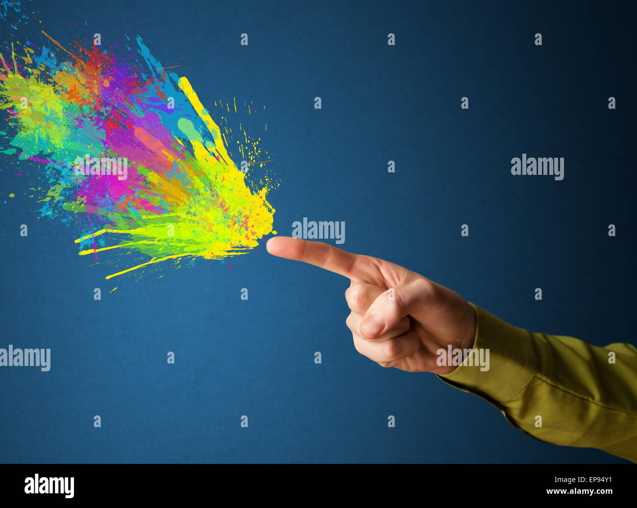 Colorful splashes are coming out of gun shaped hands Stock Photo - Alamy