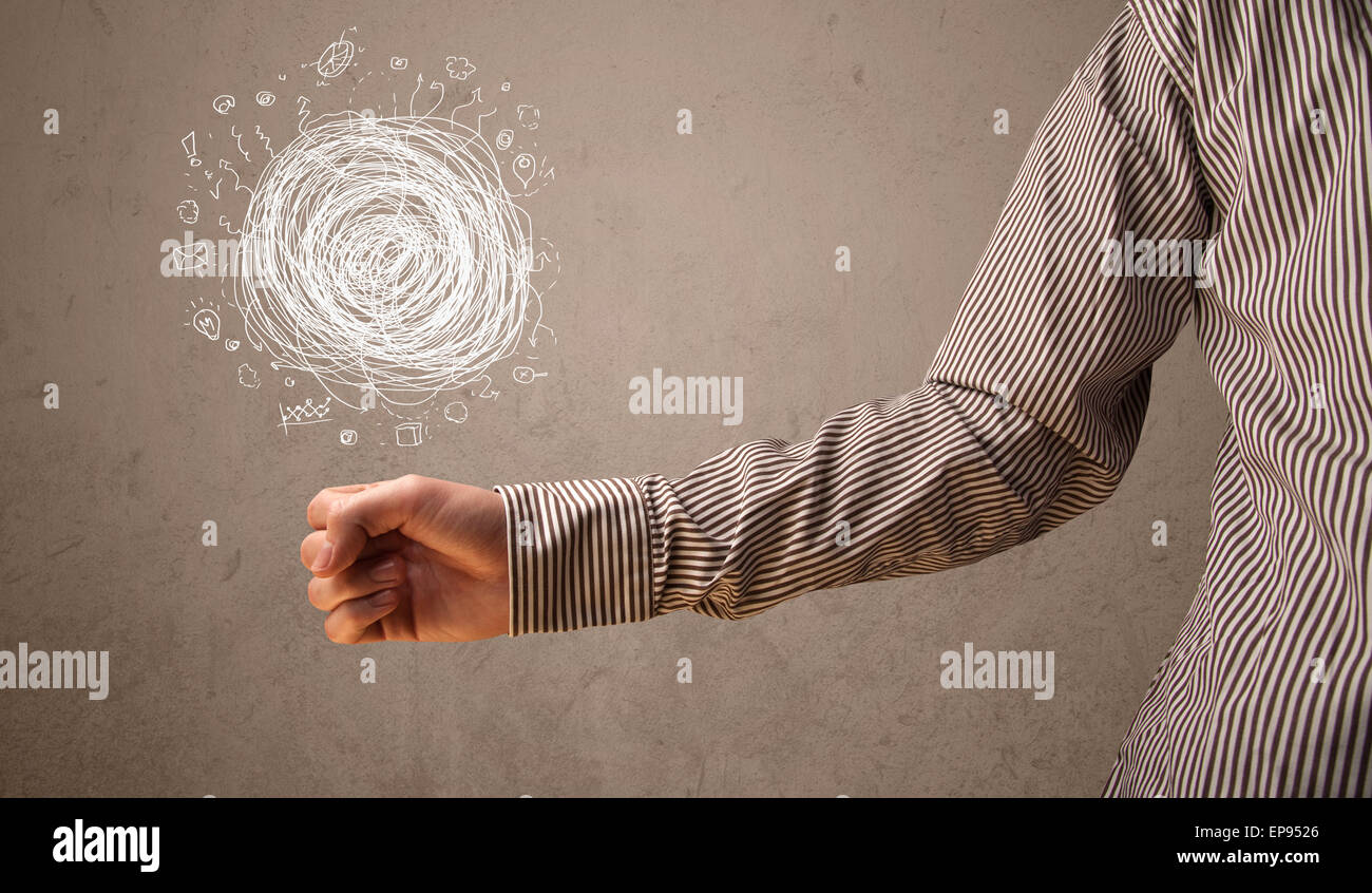 Chaos concept in the hand of a businessman Stock Photo - Alamy