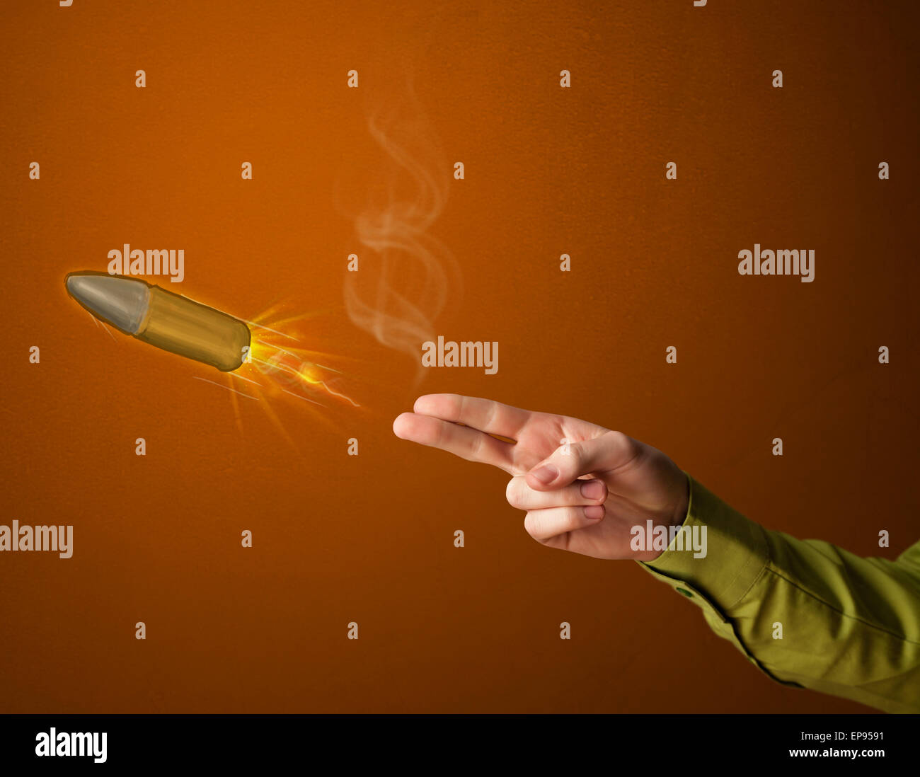 Gun shaped male hand with bullet Stock Photo - Alamy