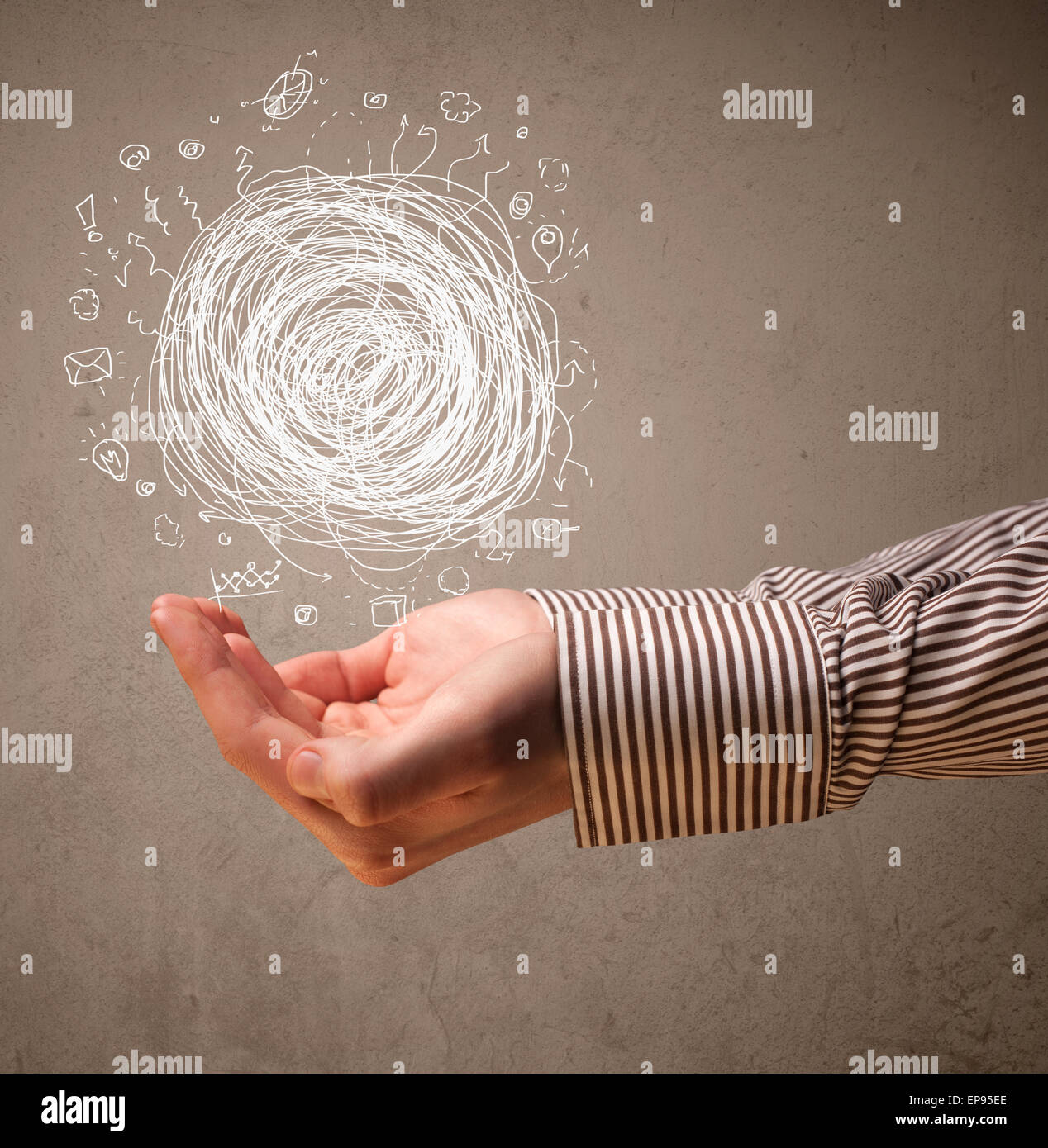 Chaos concept in the hand of a businessman Stock Photo - Alamy