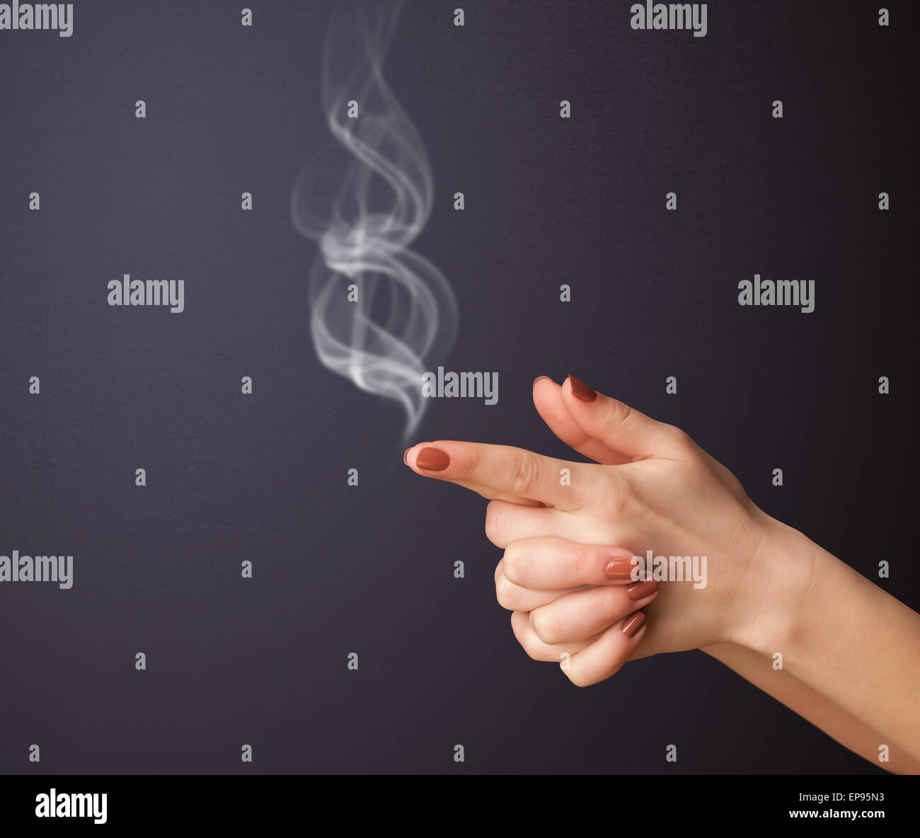 Gun shaped woman hand Stock Photo - Alamy