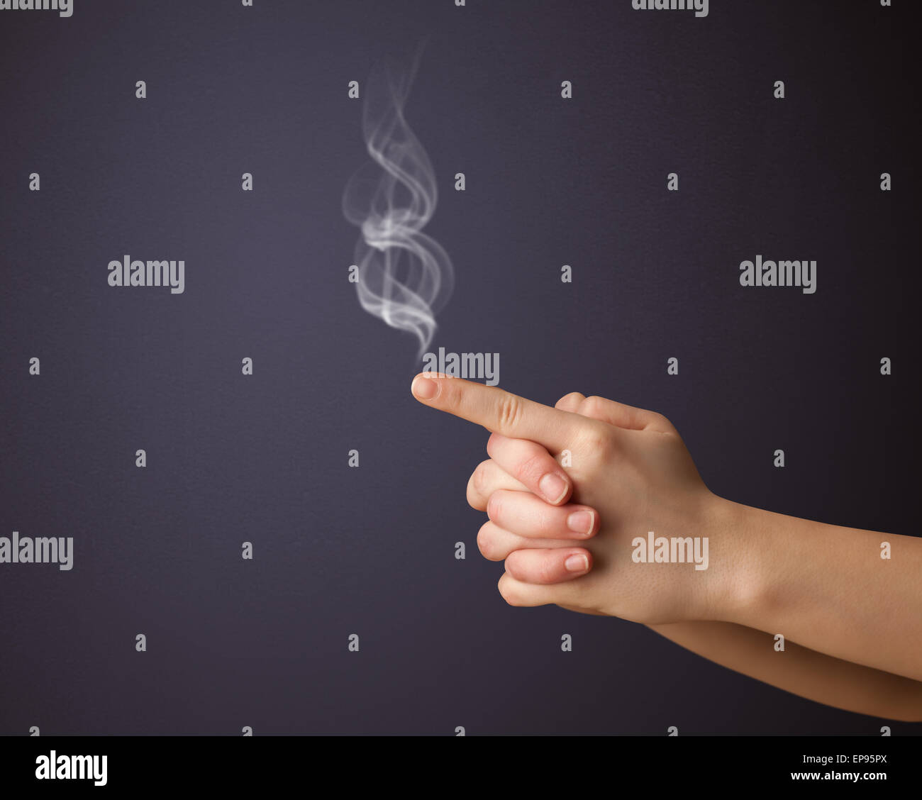 Gun shaped woman hand Stock Photo - Alamy