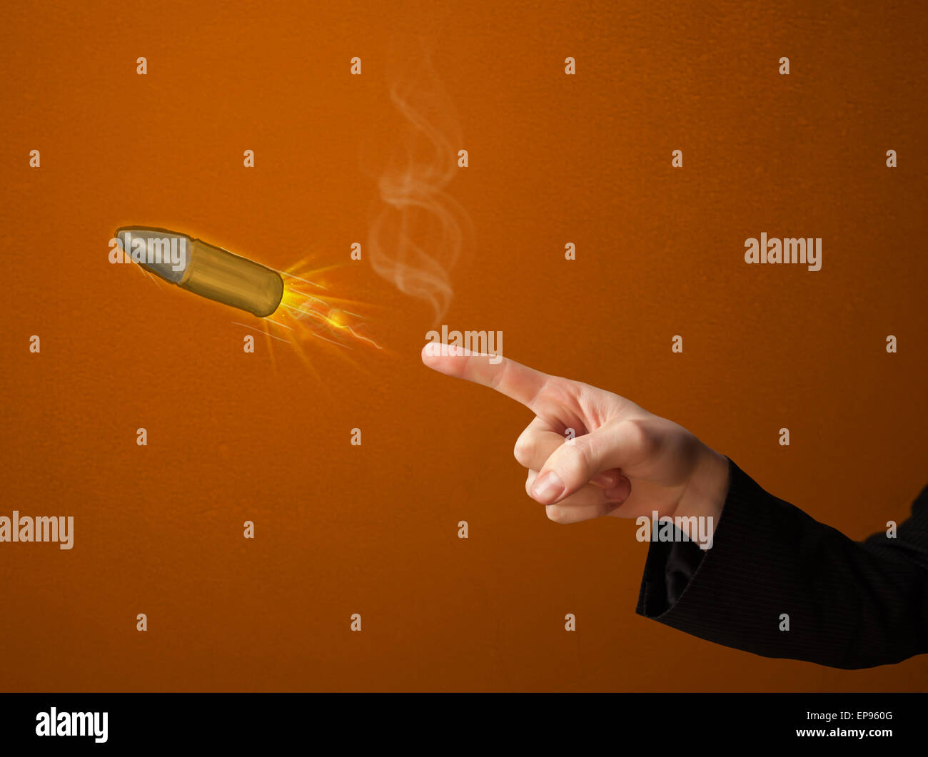 Gun shaped male hand with bullet Stock Photo - Alamy