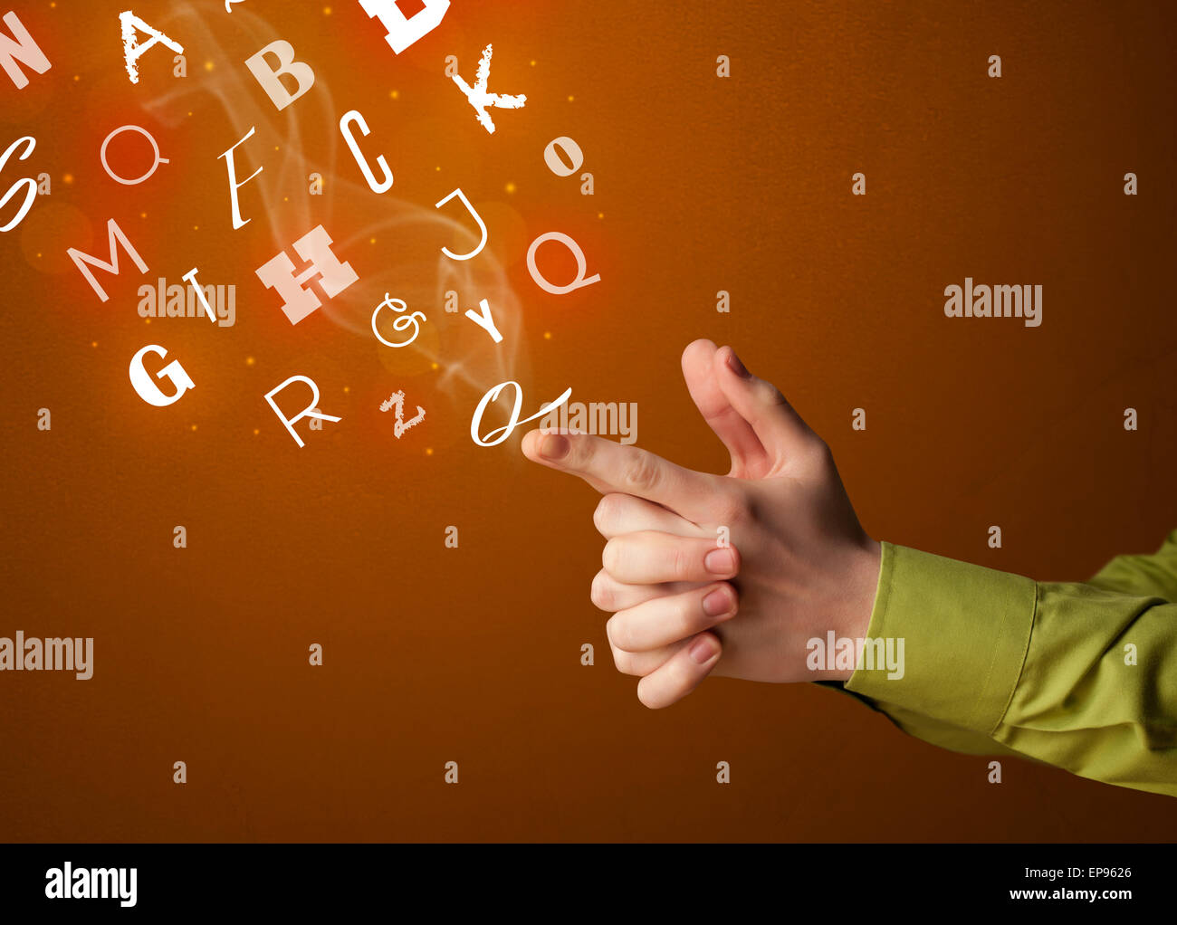 Letters coming out of gun shaped hands Stock Photo - Alamy