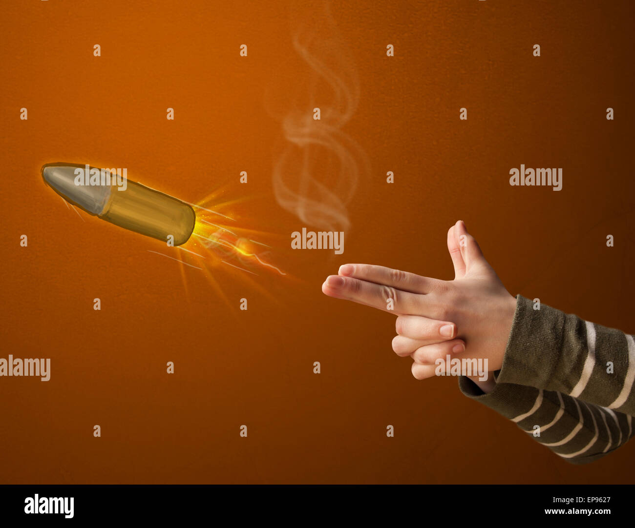 Gun shaped woman hand with bullet Stock Photo - Alamy