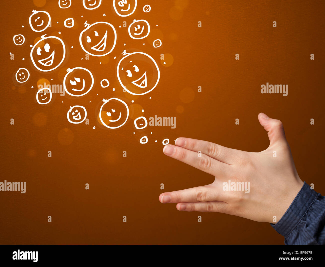 Group of happy smiley faces coming out of gun shaped hands Stock Photo ...