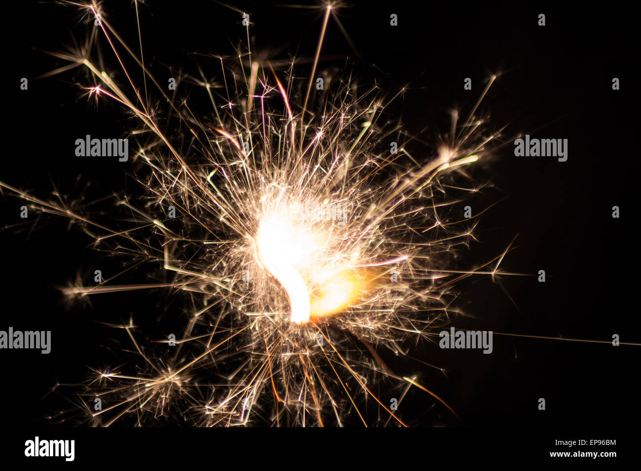 flare of the cracker on black background Stock Photo - Alamy