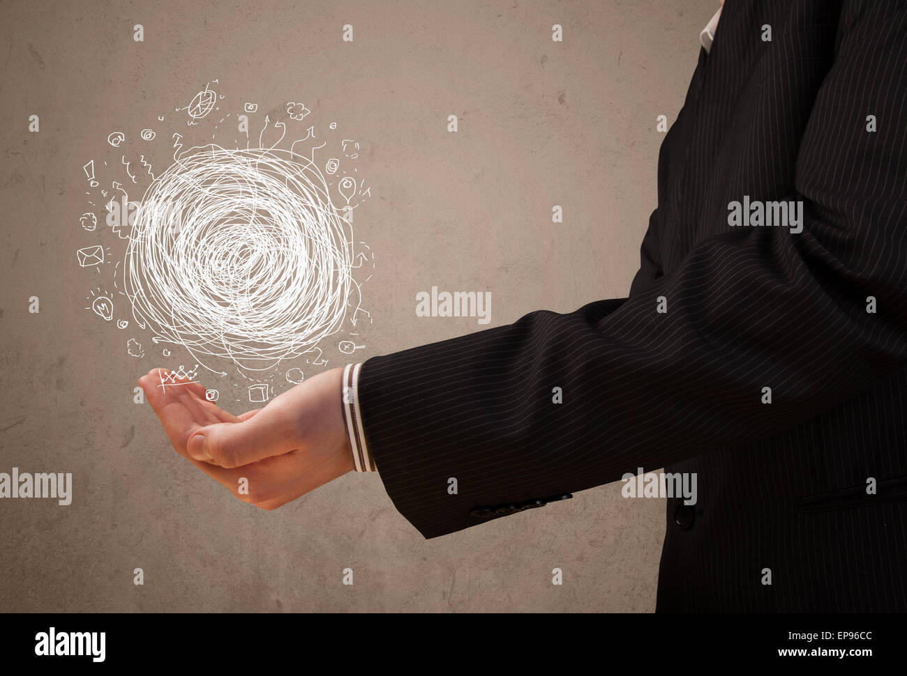 Chaos concept in the hand of a businessman Stock Photo - Alamy