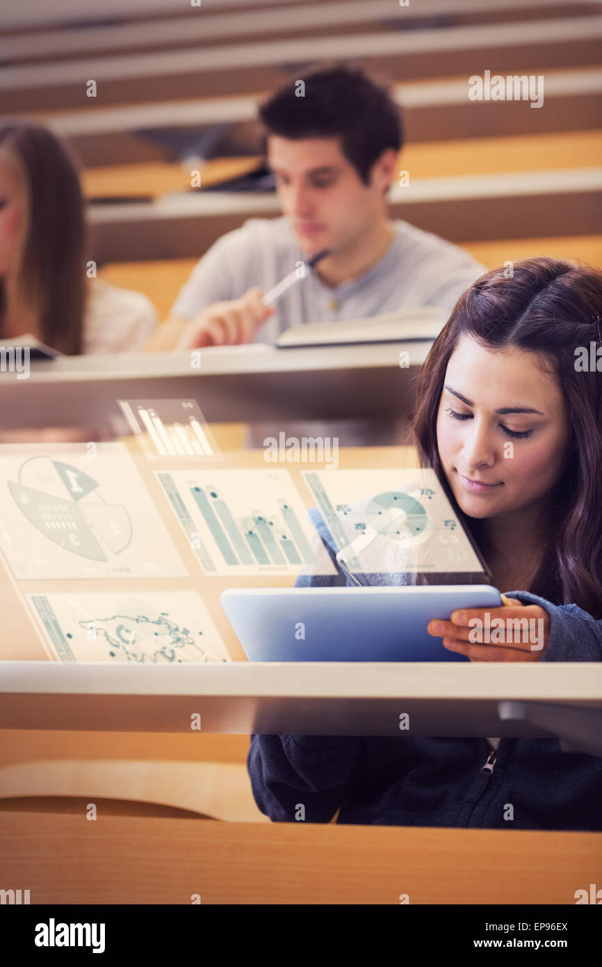 Student analysing graphs on her digital tablet computer Stock Photo - Alamy