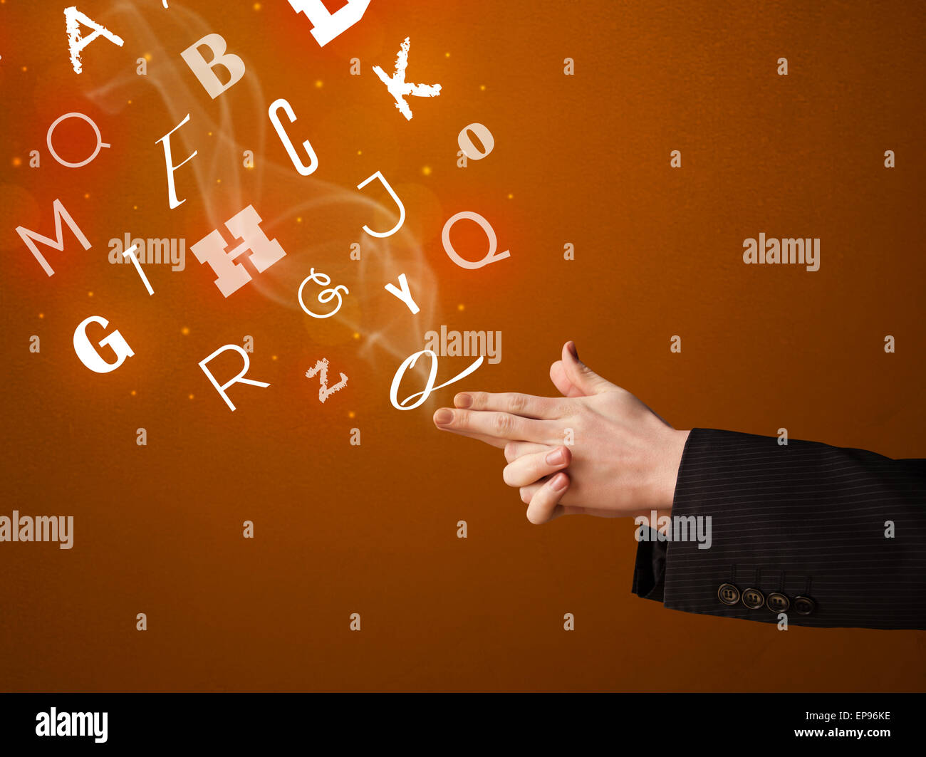 Letters coming out of gun shaped hands Stock Photo - Alamy