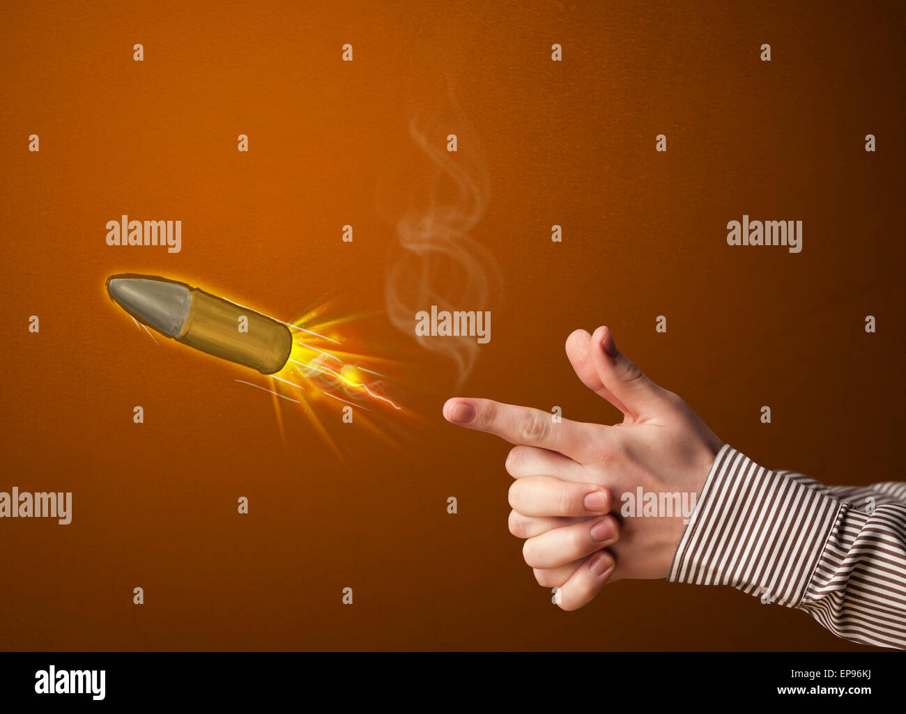 Gun shaped male hand with bullet Stock Photo - Alamy