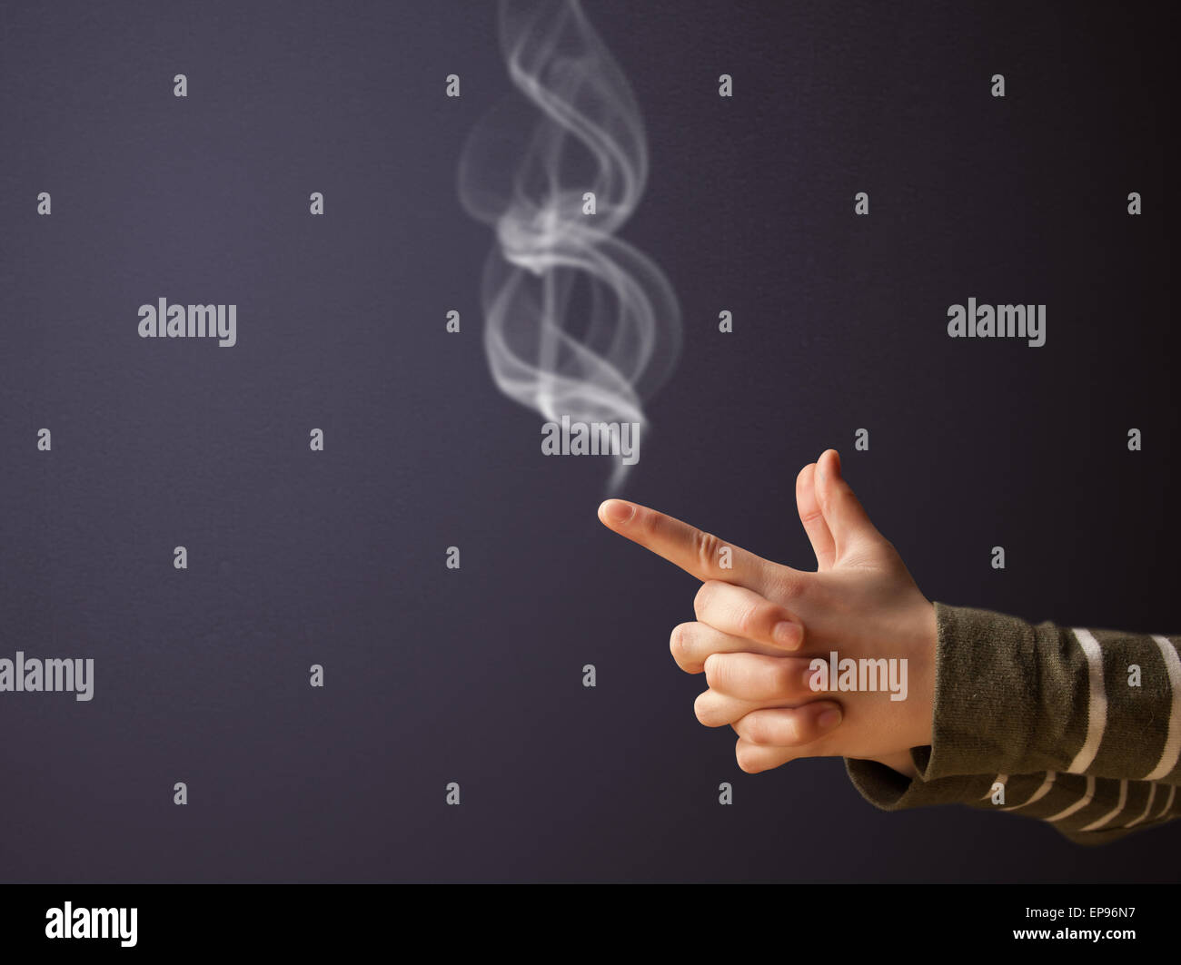 Gun shaped woman hand Stock Photo - Alamy