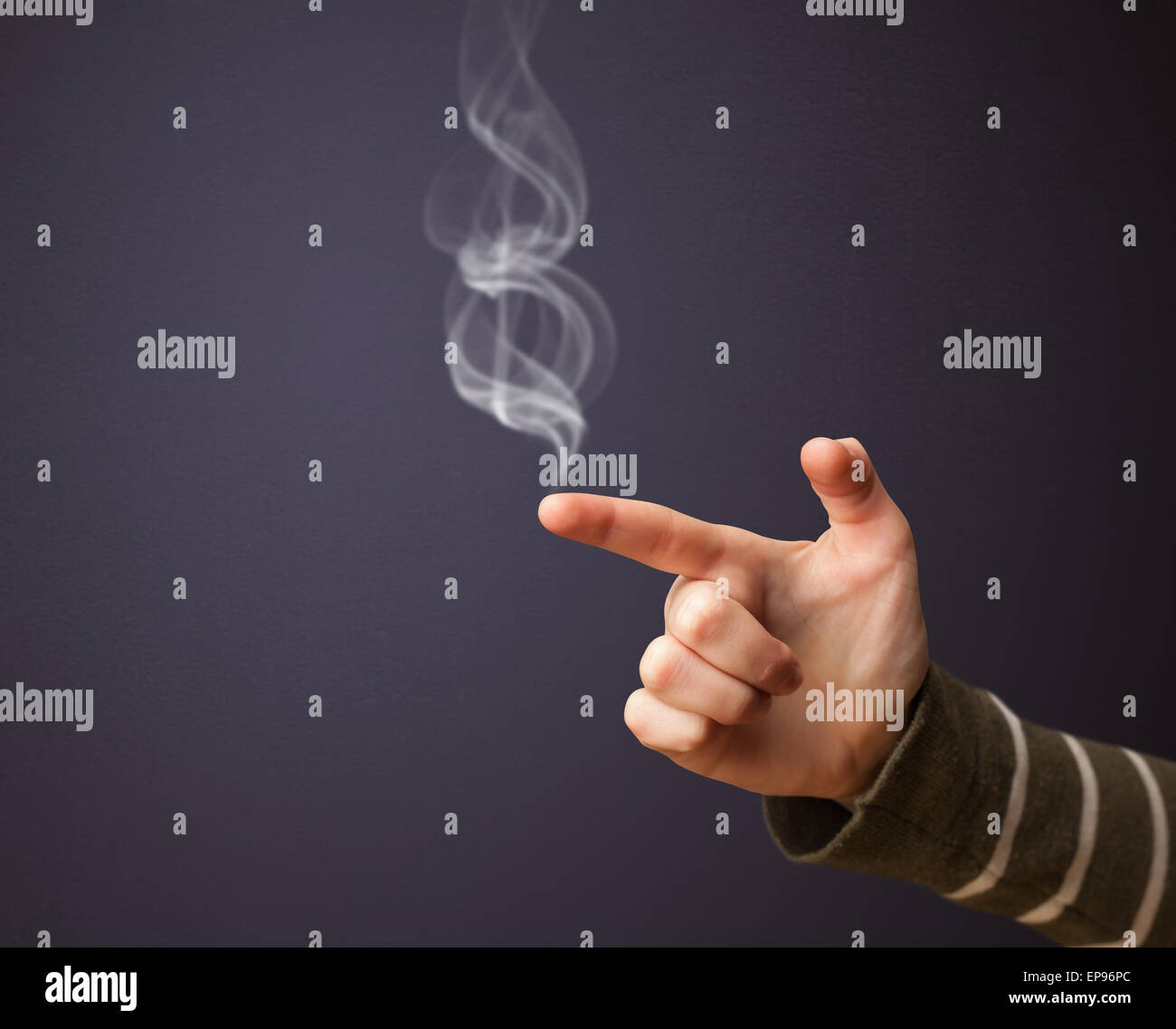 Gun shaped woman hand Stock Photo - Alamy