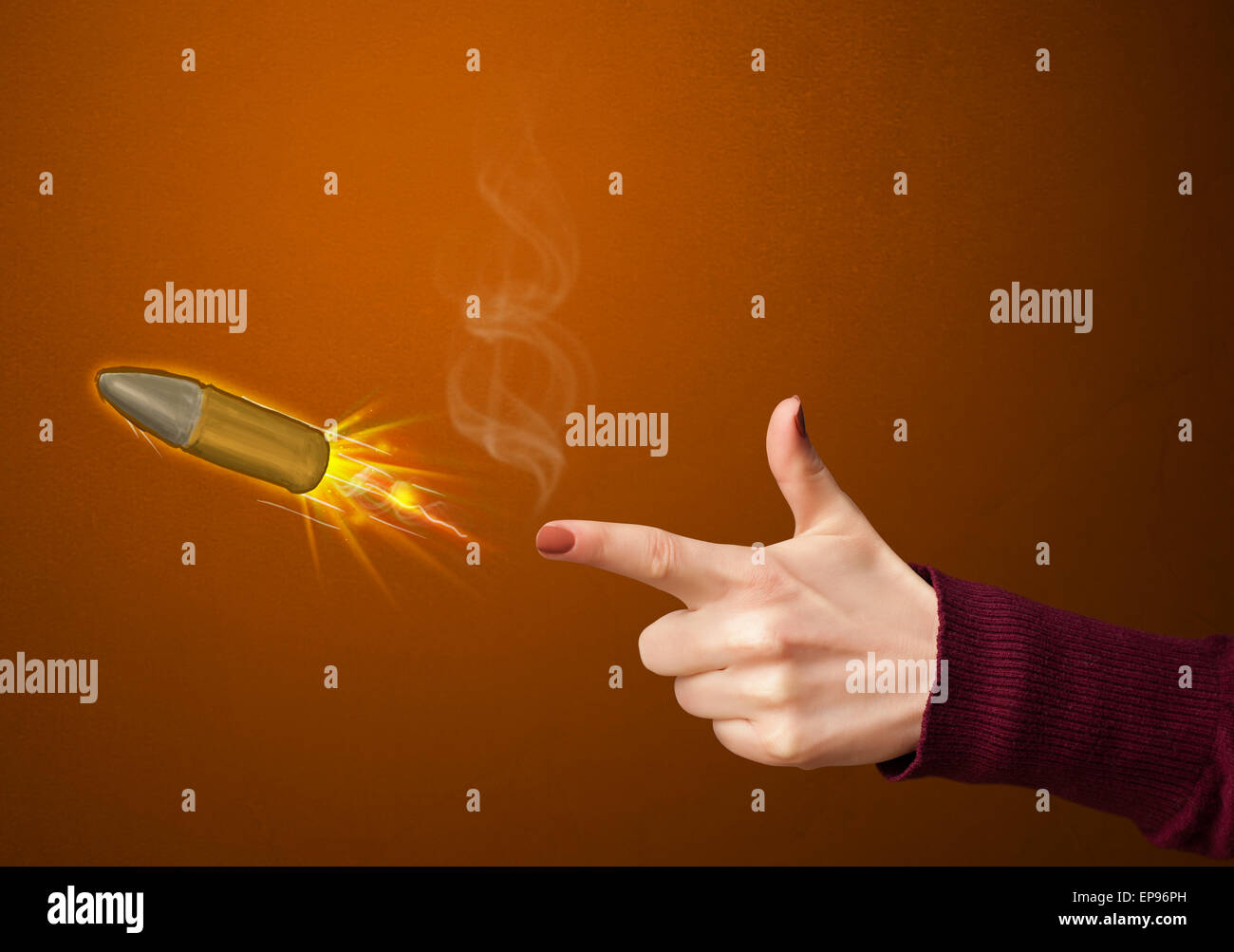 Gun shaped woman hand with bullet Stock Photo - Alamy