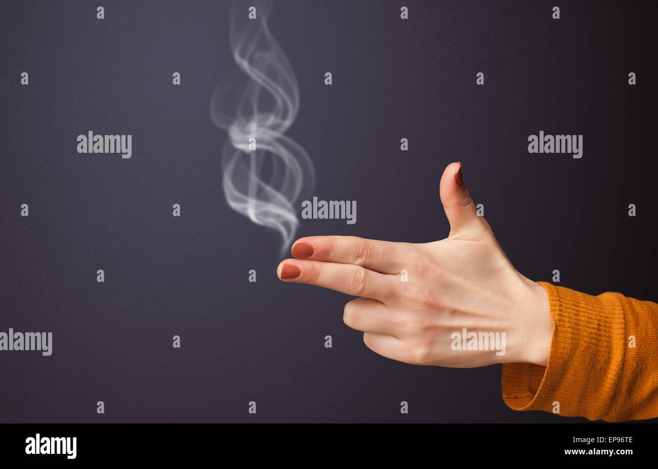 Gun shaped woman hand Stock Photo - Alamy