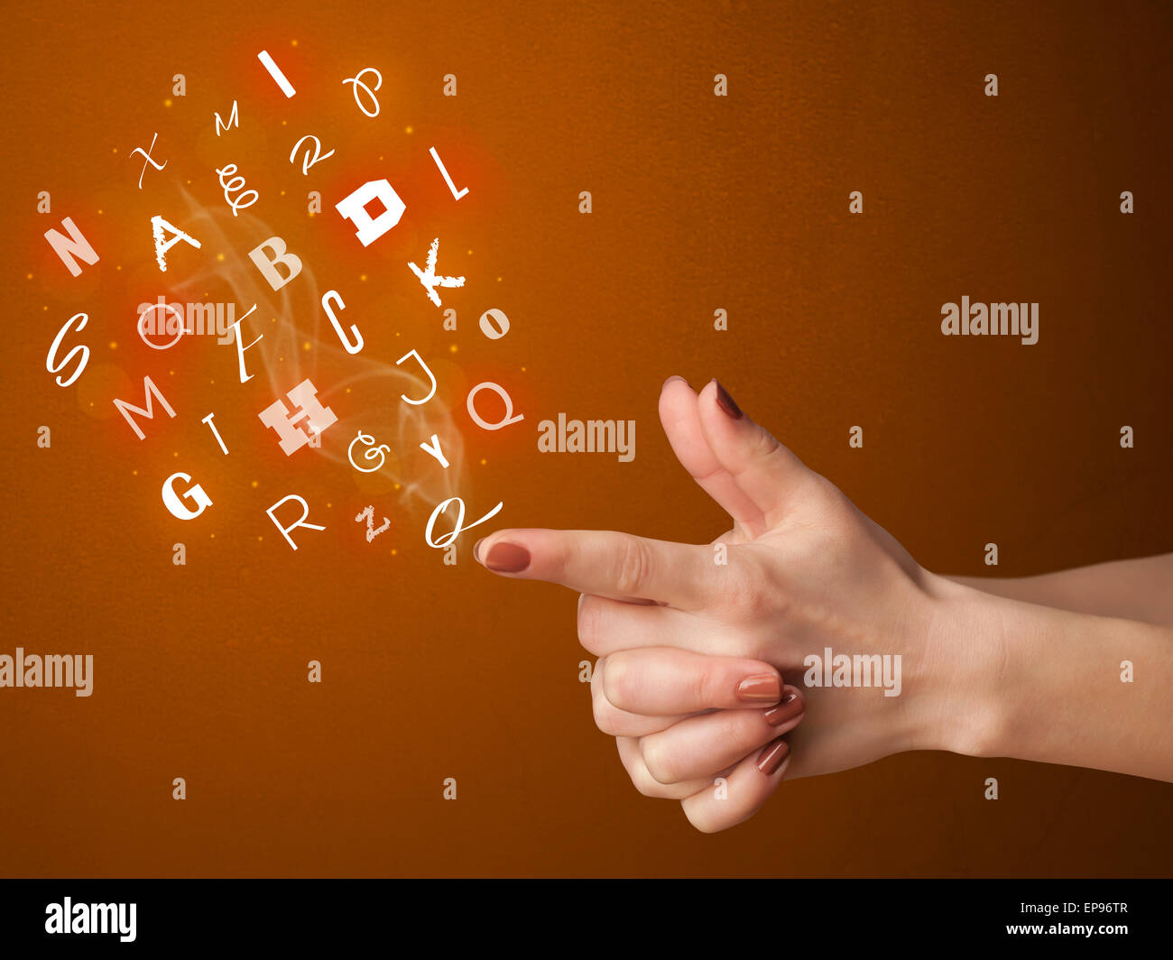 Letters coming out of gun shaped hands Stock Photo - Alamy