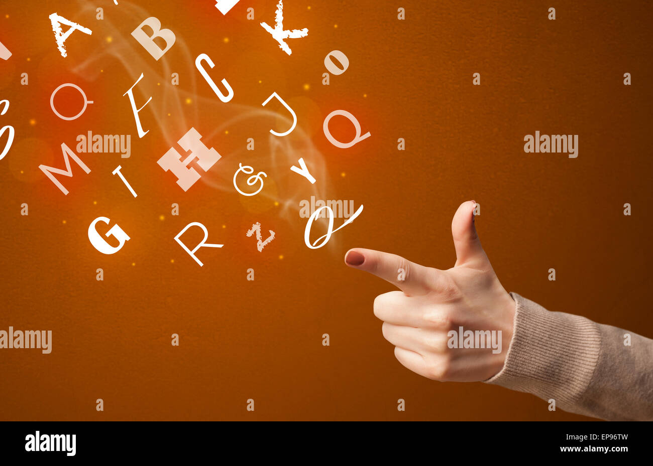 Letters coming out of gun shaped hands Stock Photo - Alamy
