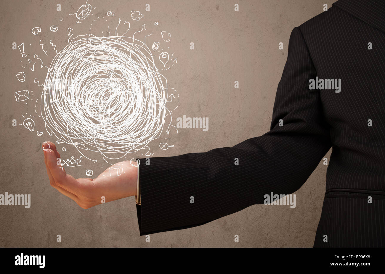 Chaos concept in the hand of a businessman Stock Photo - Alamy