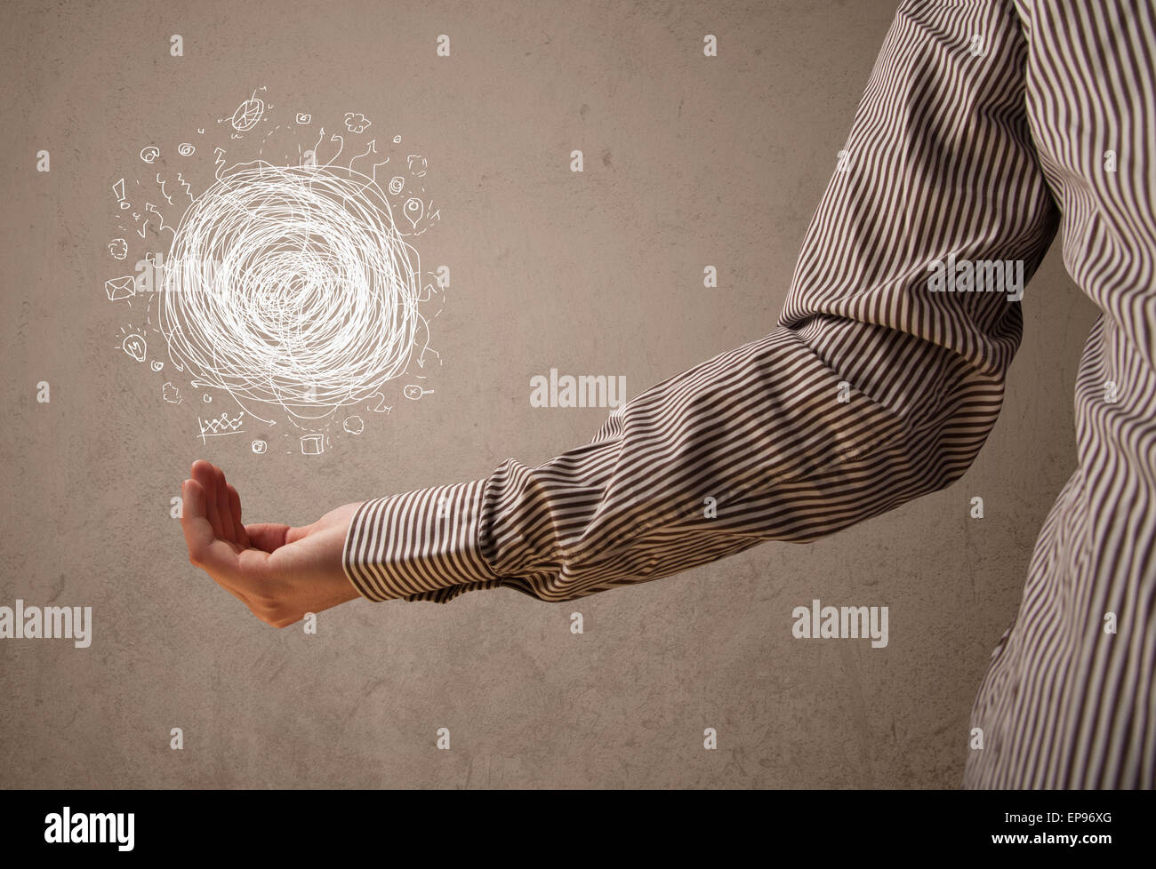 Chaos concept in the hand of a businessman Stock Photo - Alamy