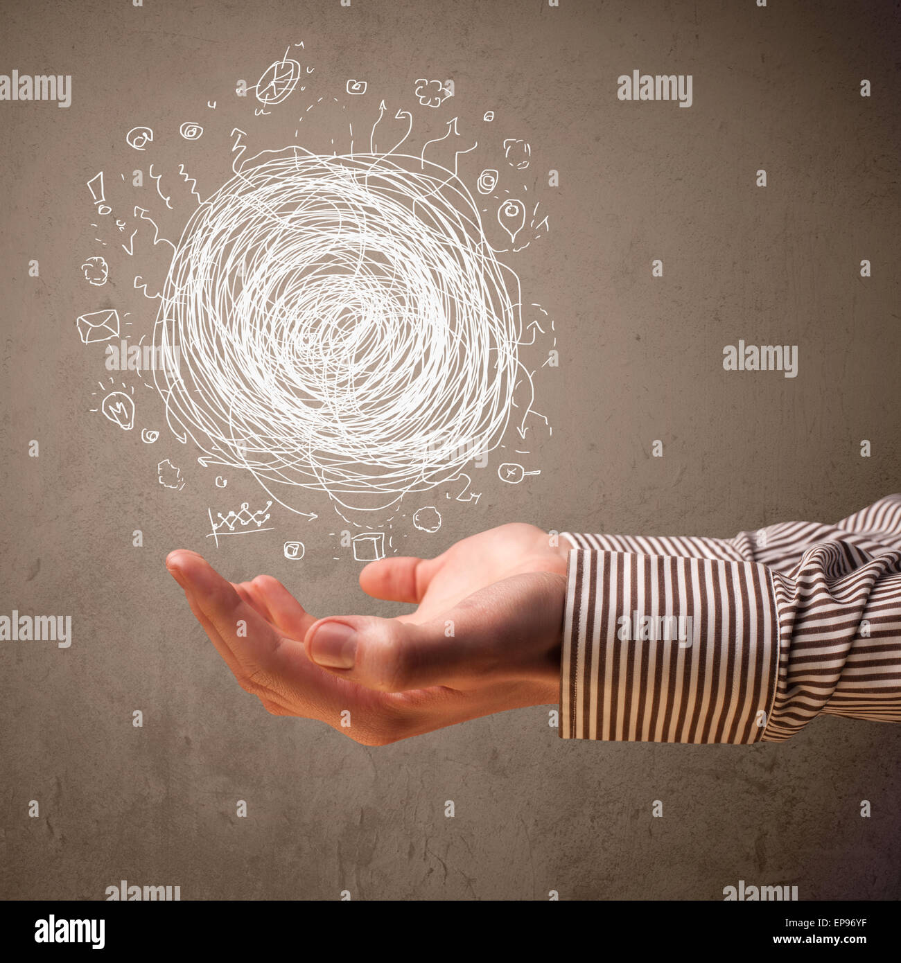 Chaos concept in the hand of a businessman Stock Photo - Alamy