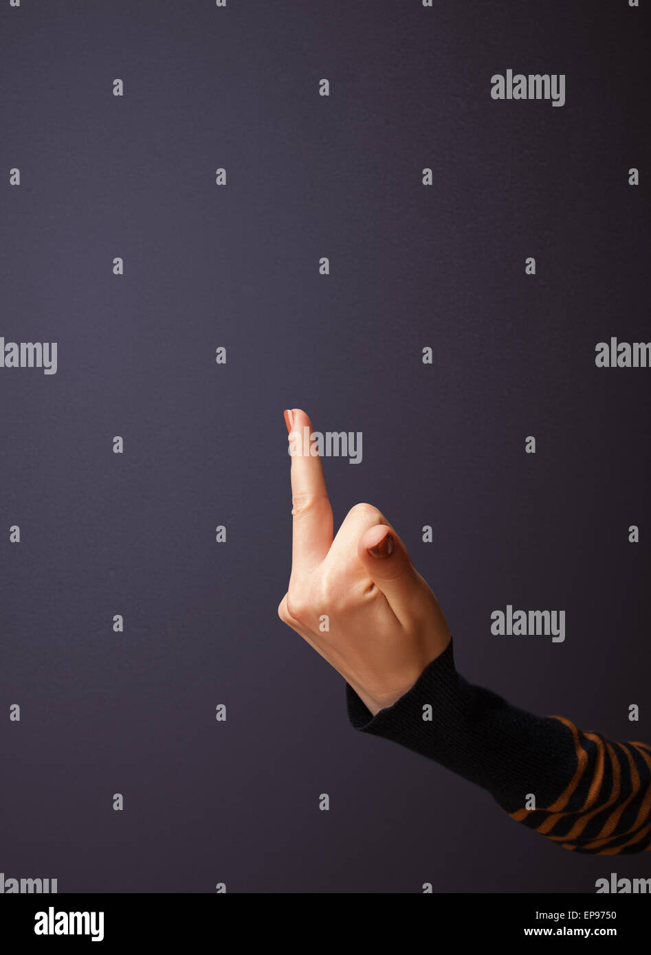 Gun shaped woman hand Stock Photo - Alamy