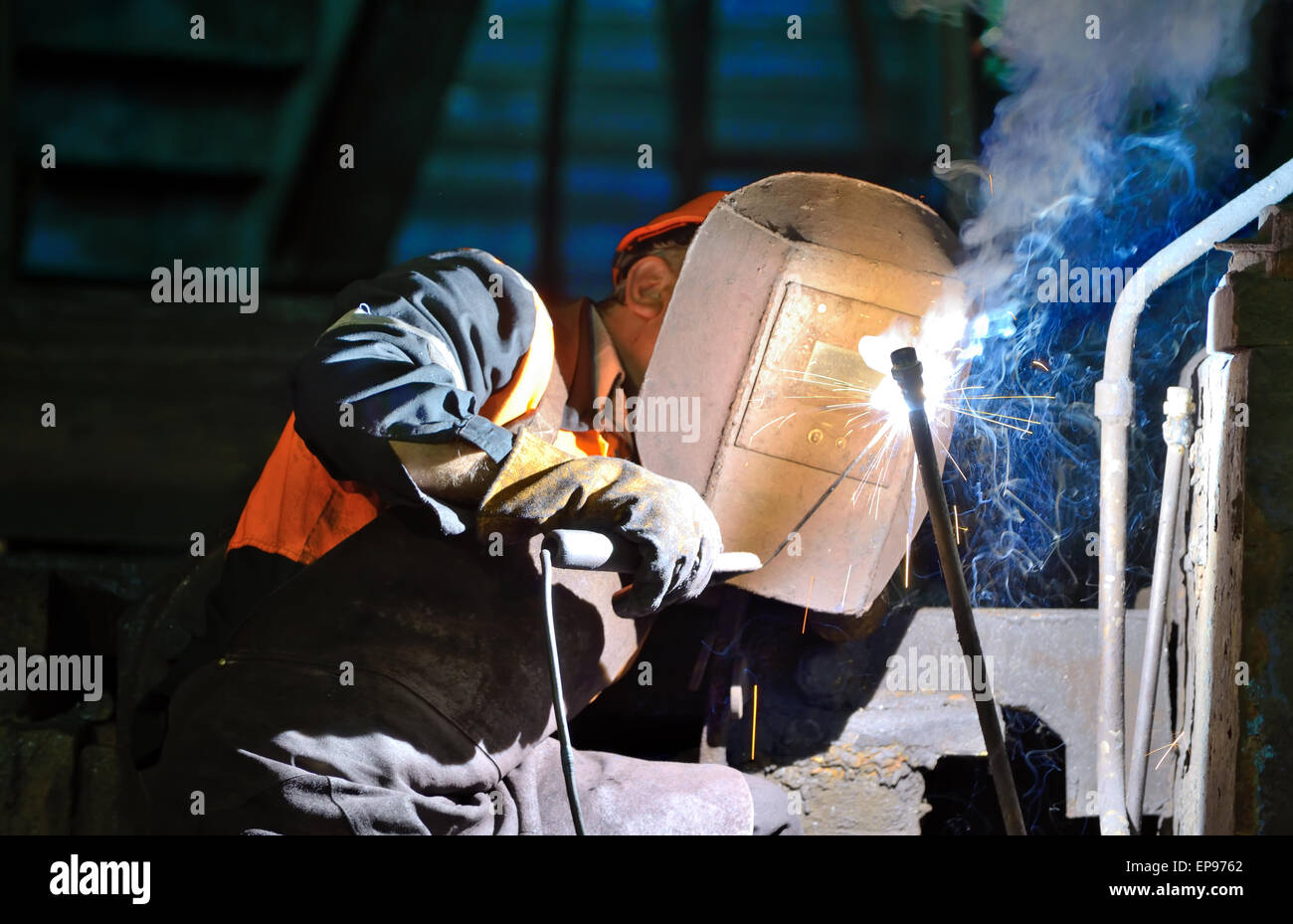 welder working in manufacture production plant Stock Photo - Alamy