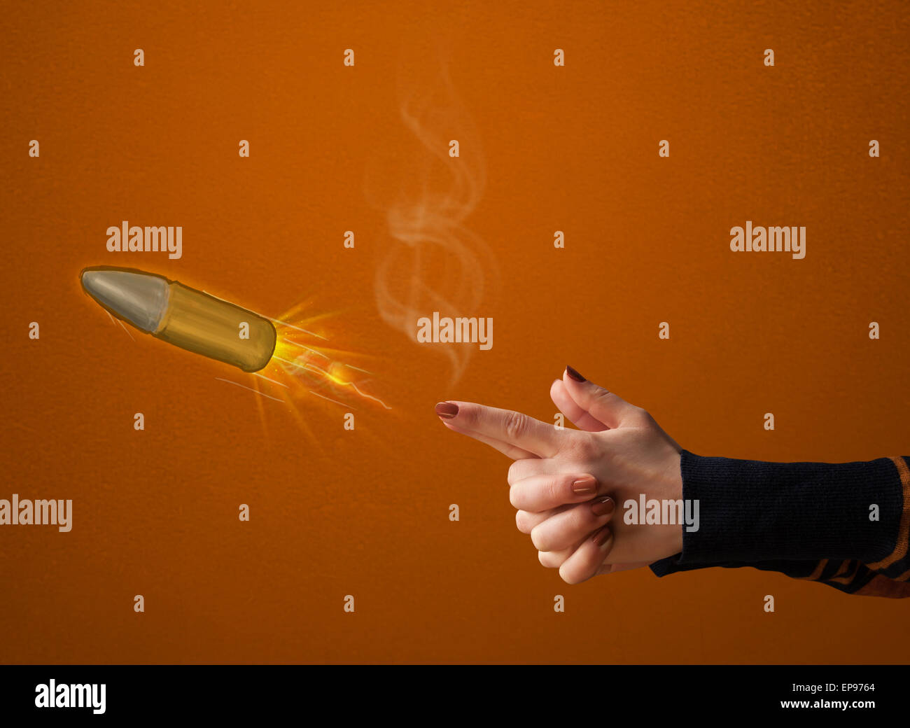 Gun shaped woman hand with bullet Stock Photo - Alamy