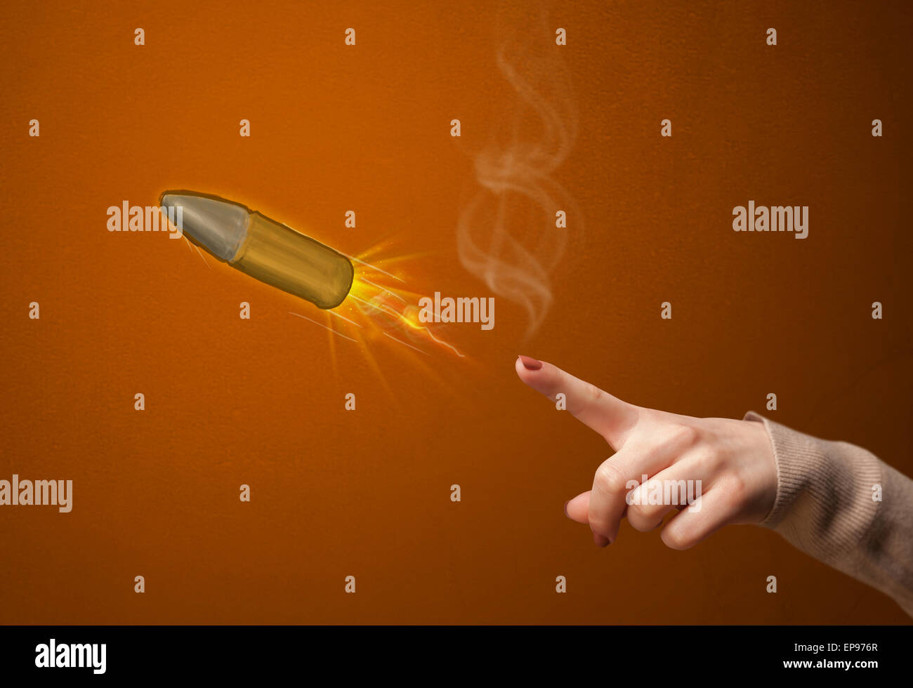 Gun shaped woman hand with bullet Stock Photo - Alamy