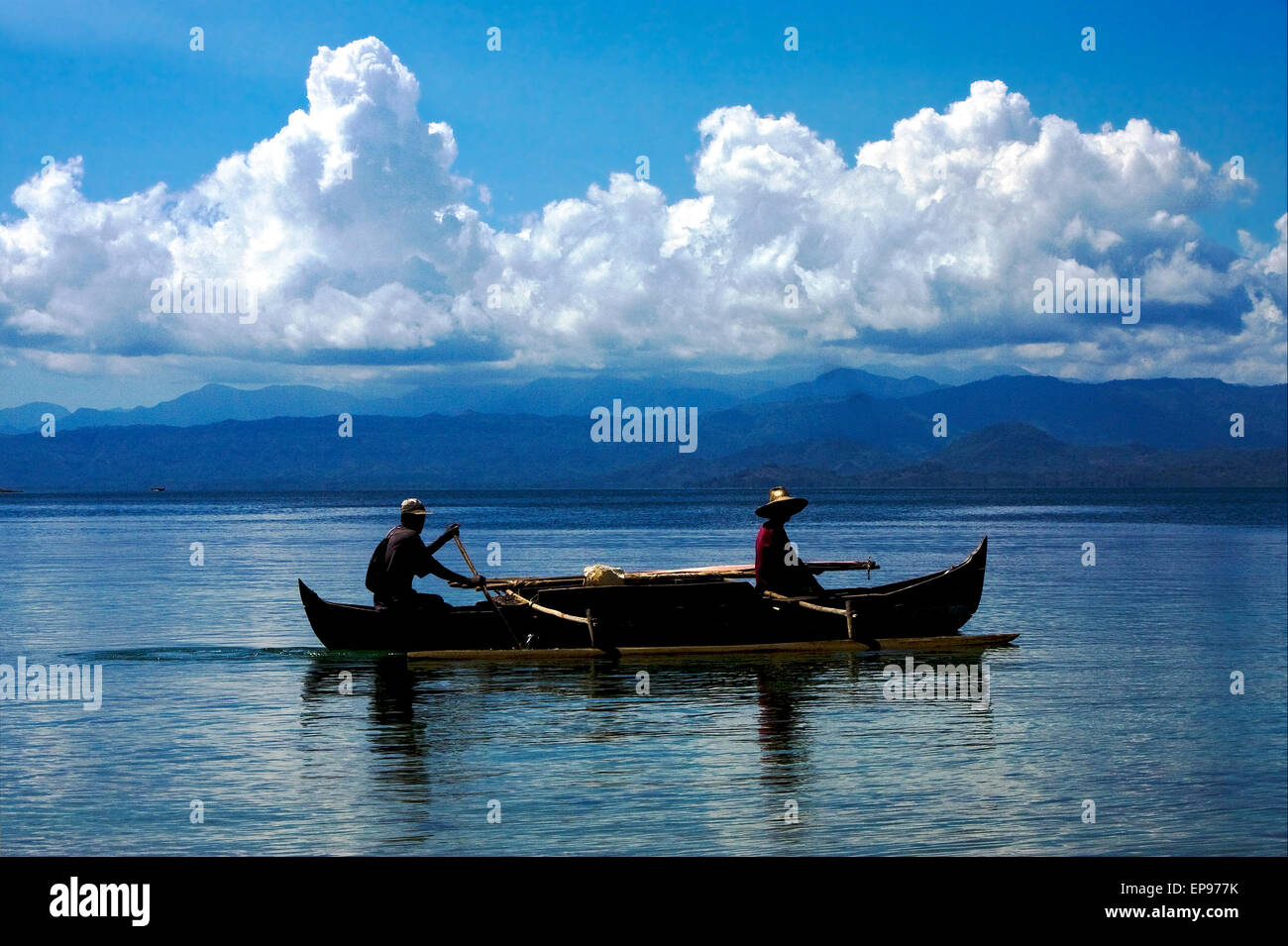 two man in a boat in madagascar for fishing Stock Photo - Alamy