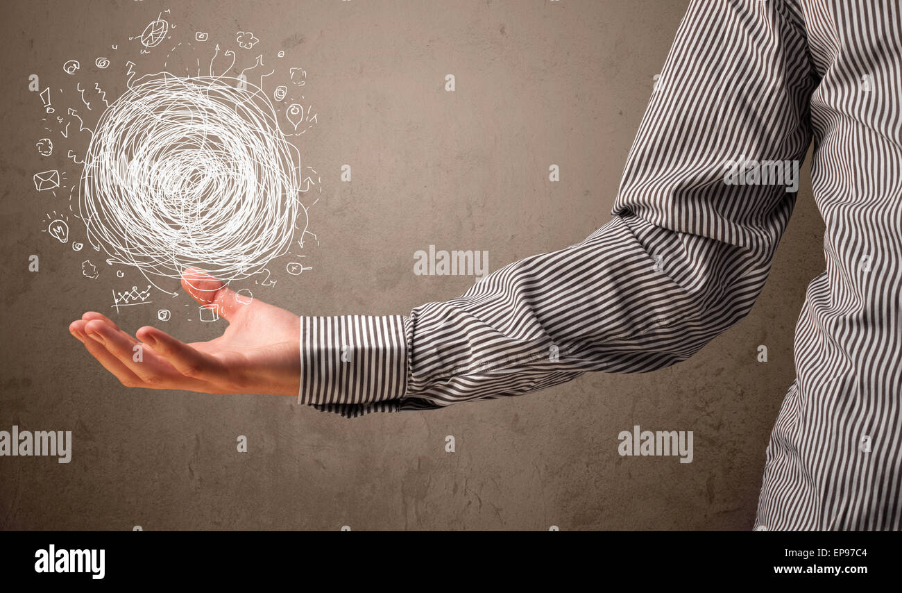Chaos concept in the hand of a businessman Stock Photo - Alamy