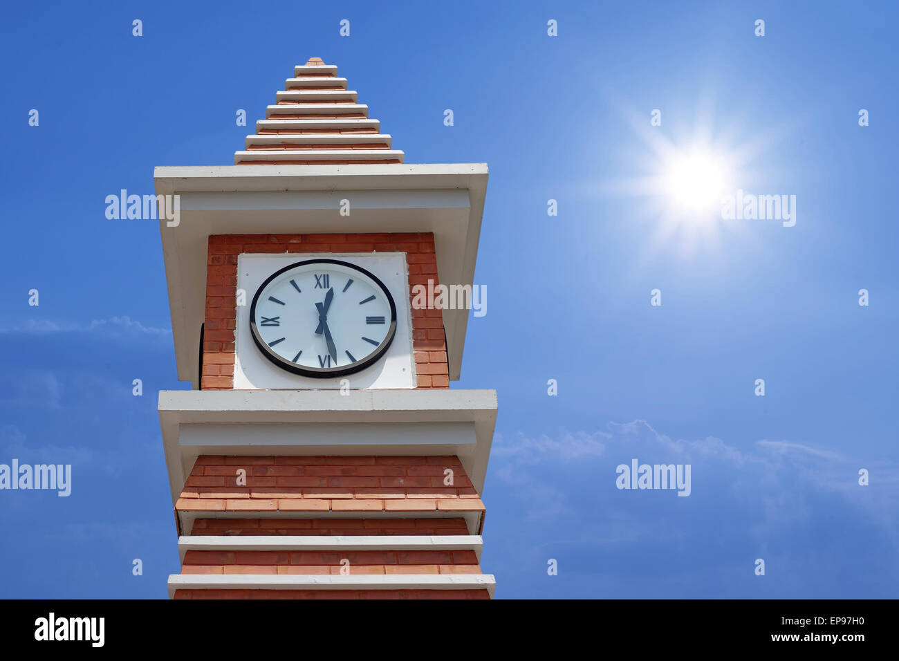 clock tower with beautiful sun and sky background Stock Photo - Alamy
