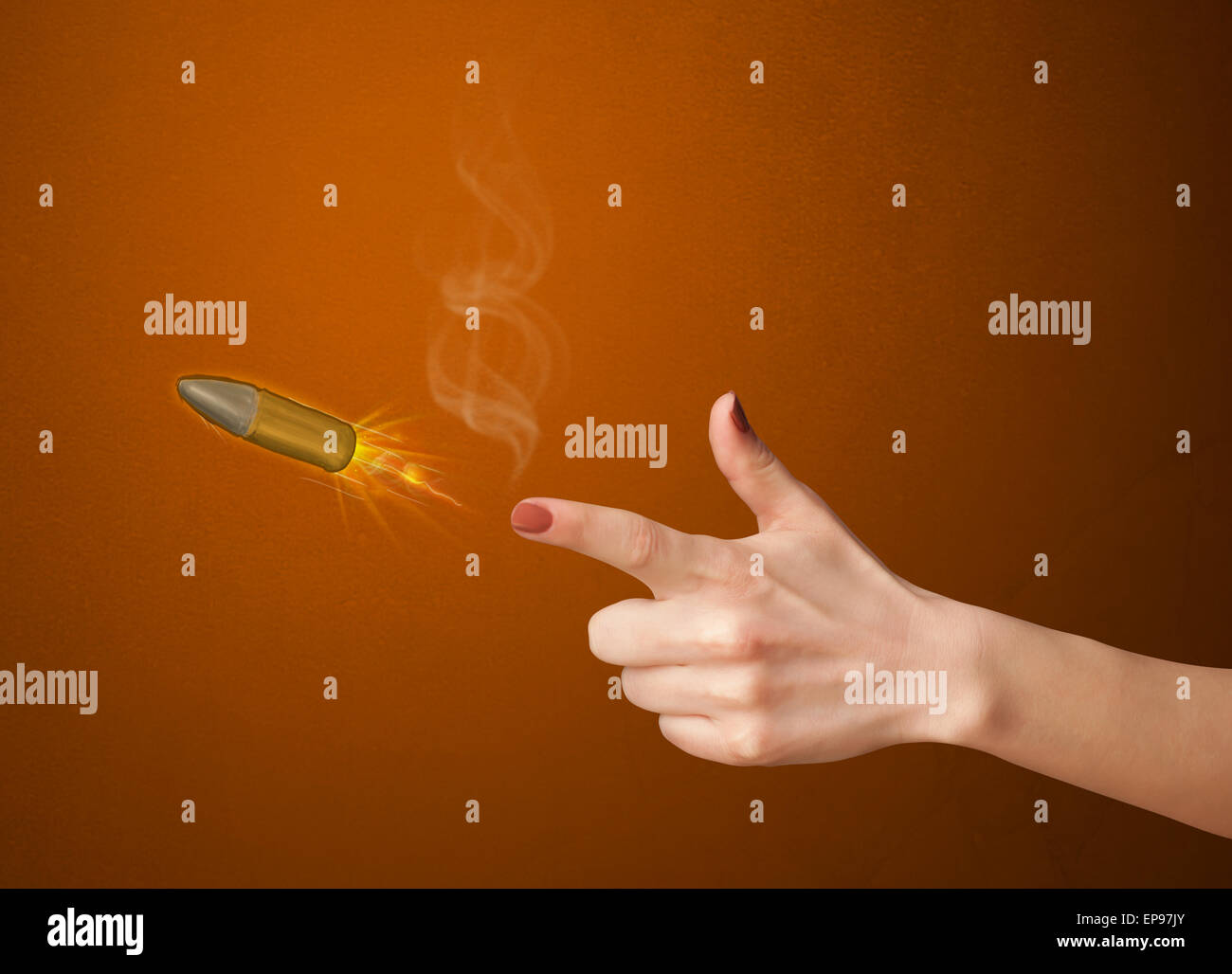 Gun shaped woman hand with bullet Stock Photo - Alamy