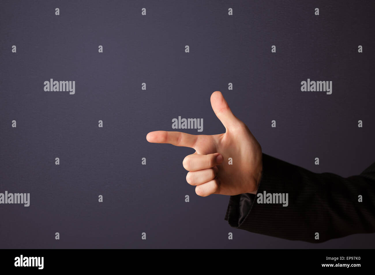Gun shaped man hand Stock Photo - Alamy