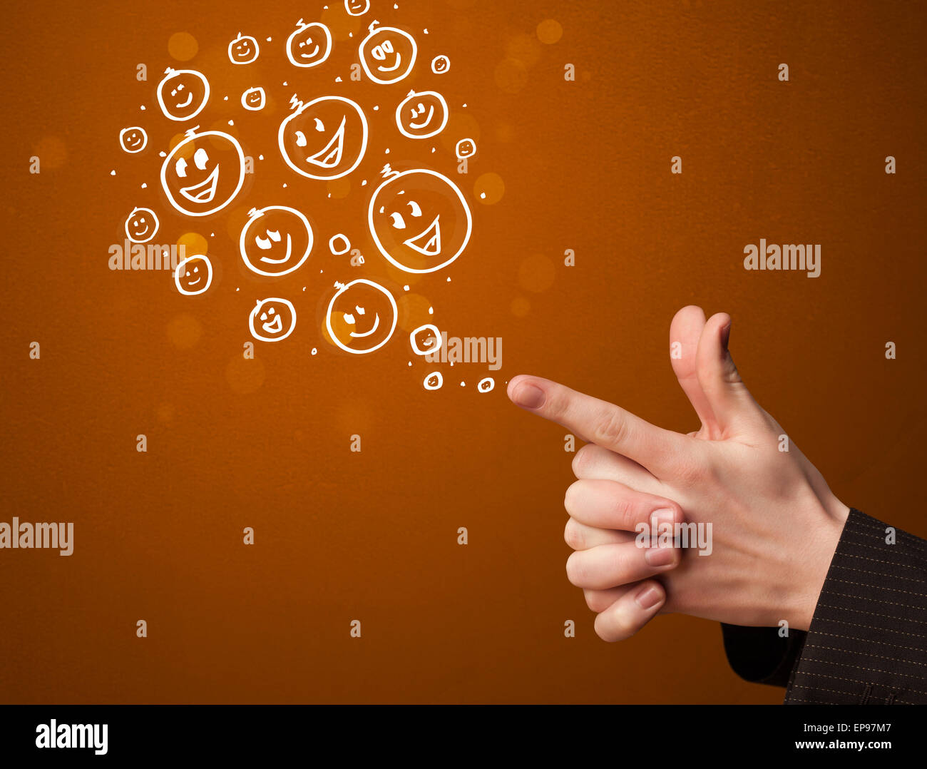 Group of happy smiley faces coming out of gun shaped hands Stock Photo ...