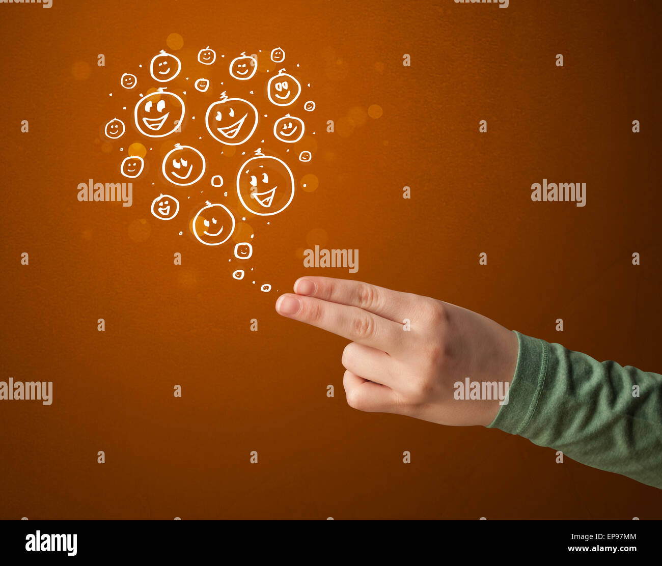 Group of happy smiley faces coming out of gun shaped hands Stock Photo ...