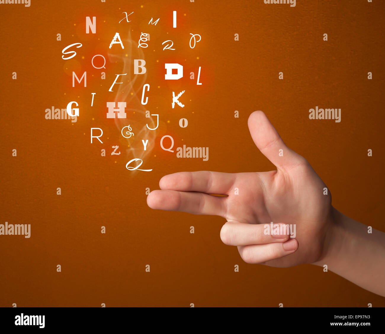 Letters coming out of gun shaped hands Stock Photo - Alamy
