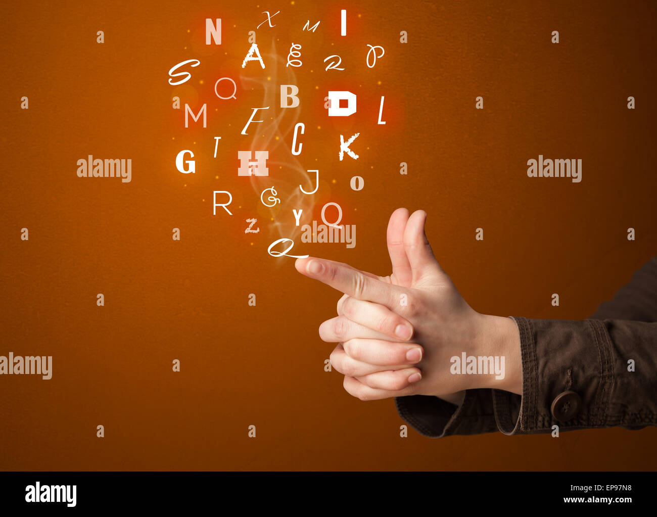 Letters coming out of gun shaped hands Stock Photo - Alamy