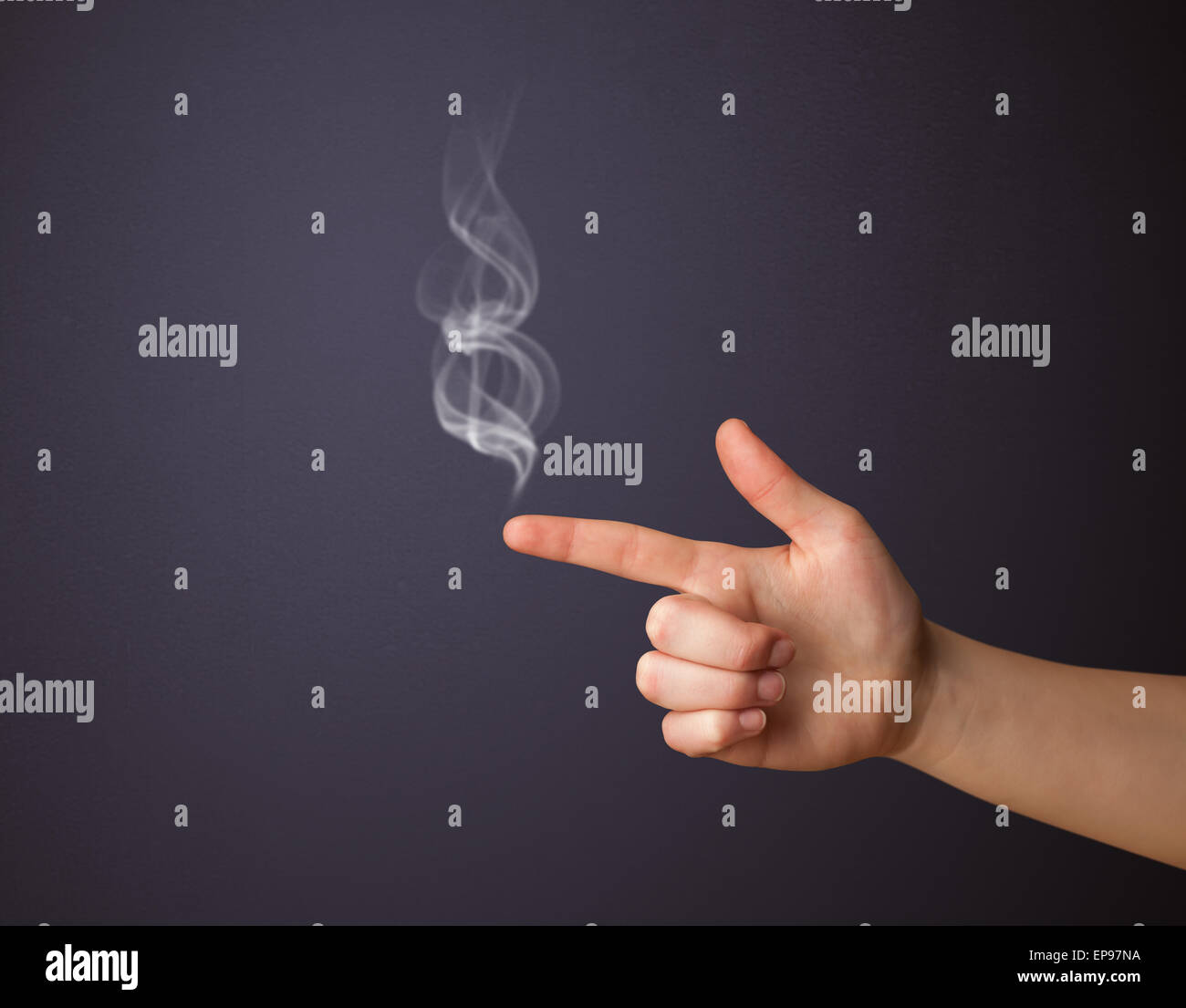 Gun shaped woman hand Stock Photo - Alamy