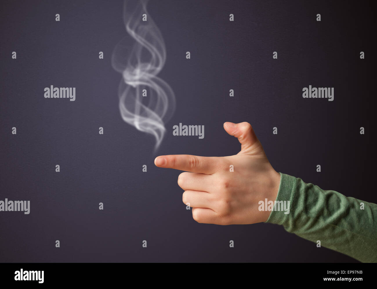 Gun shaped woman hand Stock Photo - Alamy