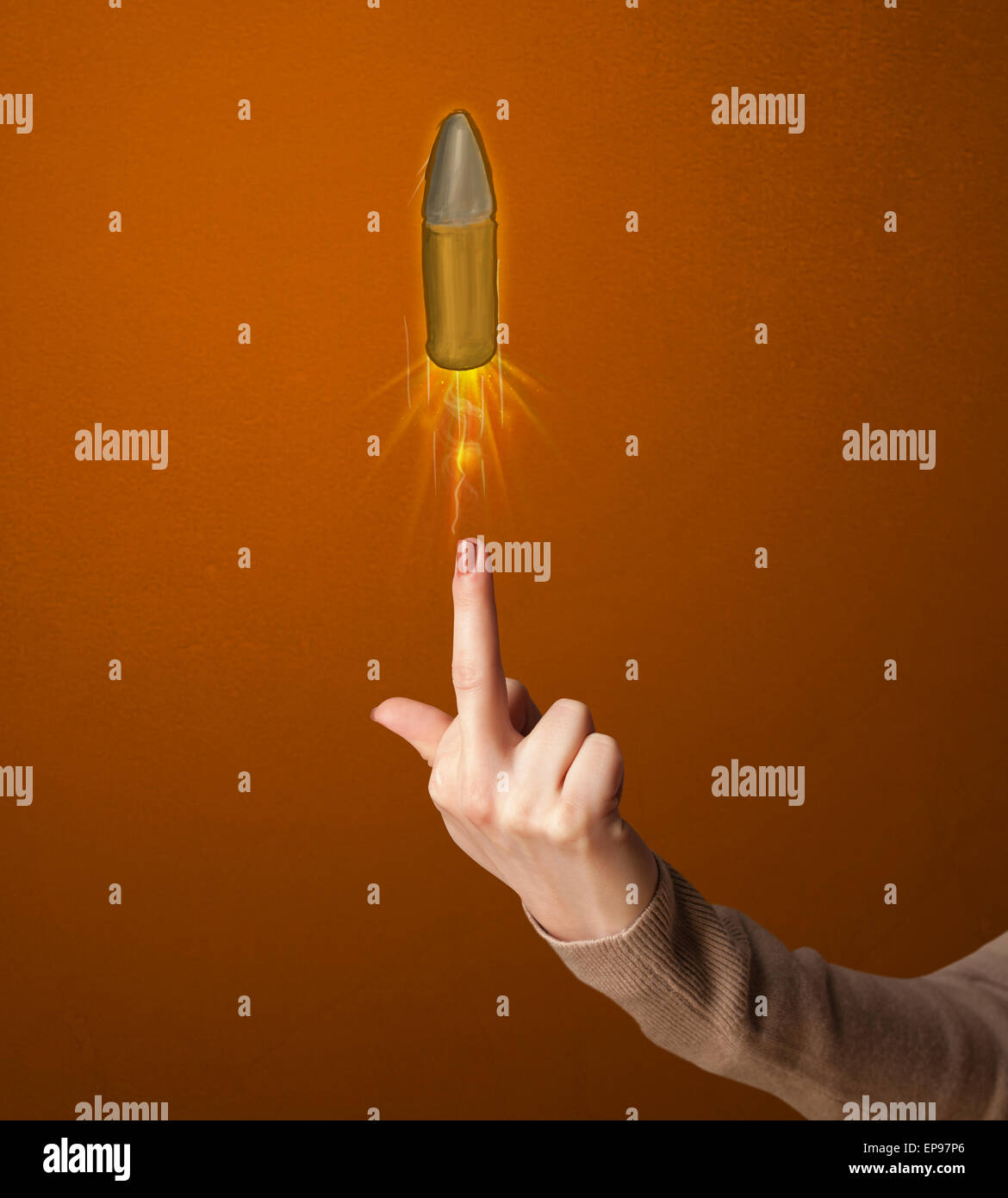 Gun shaped woman hand with bullet Stock Photo - Alamy