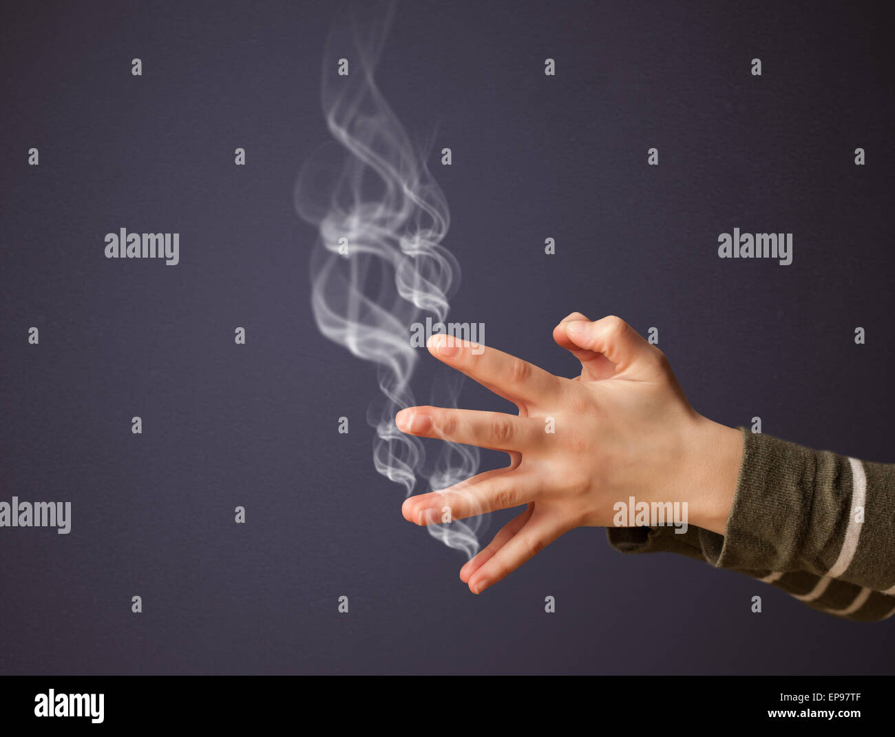 Gun shaped woman hand Stock Photo - Alamy