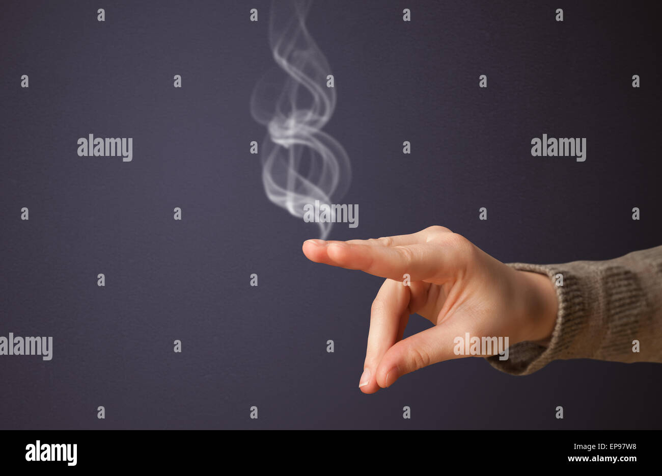 Gun shaped woman hand Stock Photo - Alamy