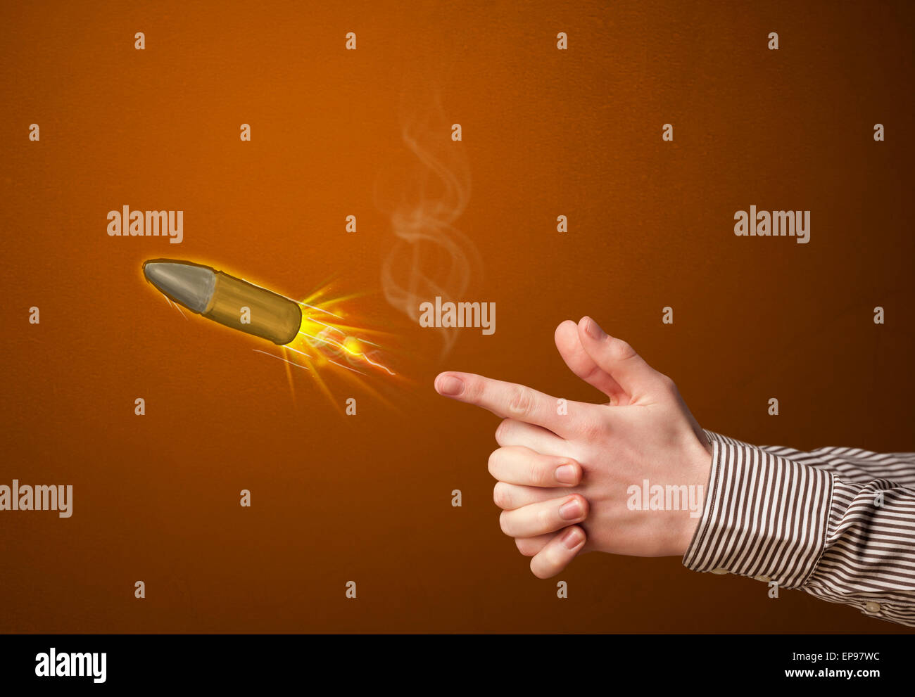 Gun shaped male hand with bullet Stock Photo - Alamy