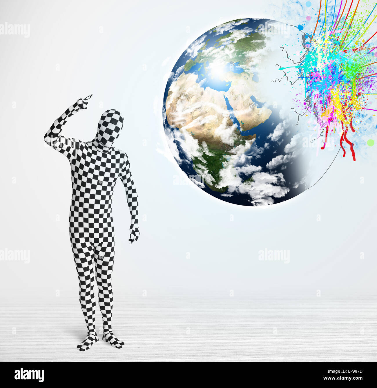 Funny man in body suit looking at colorful splatter earth Stock Photo ...