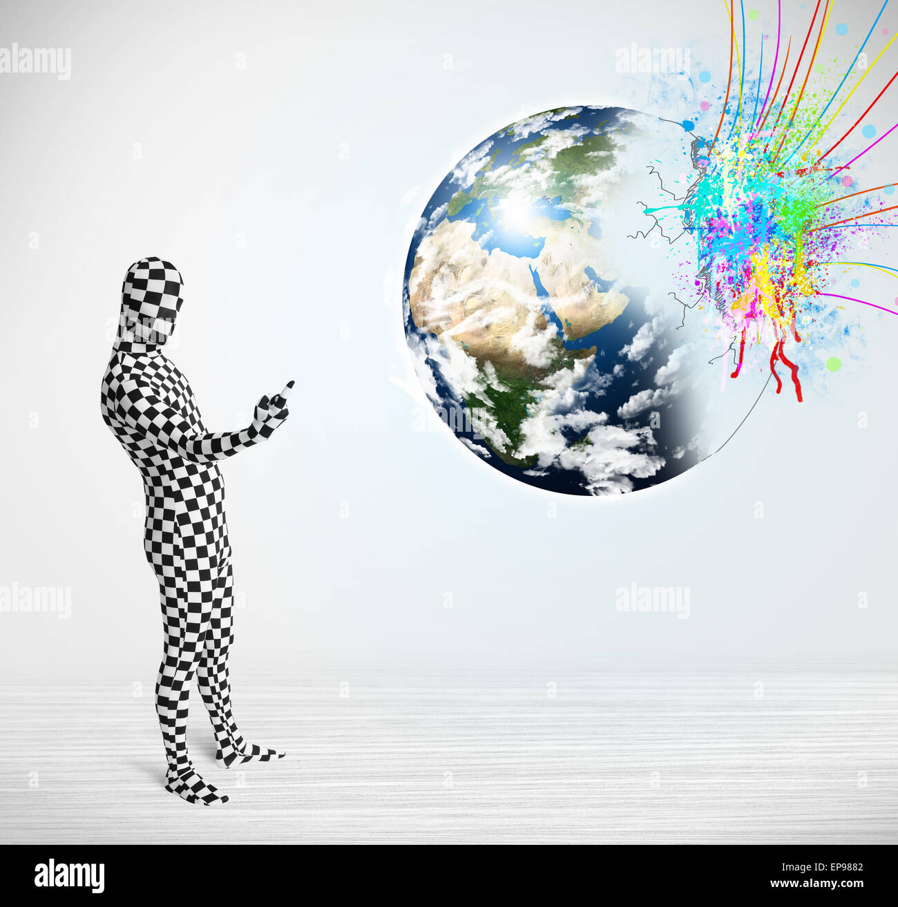 Funny man in body suit looking at colorful splatter earth Stock Photo ...
