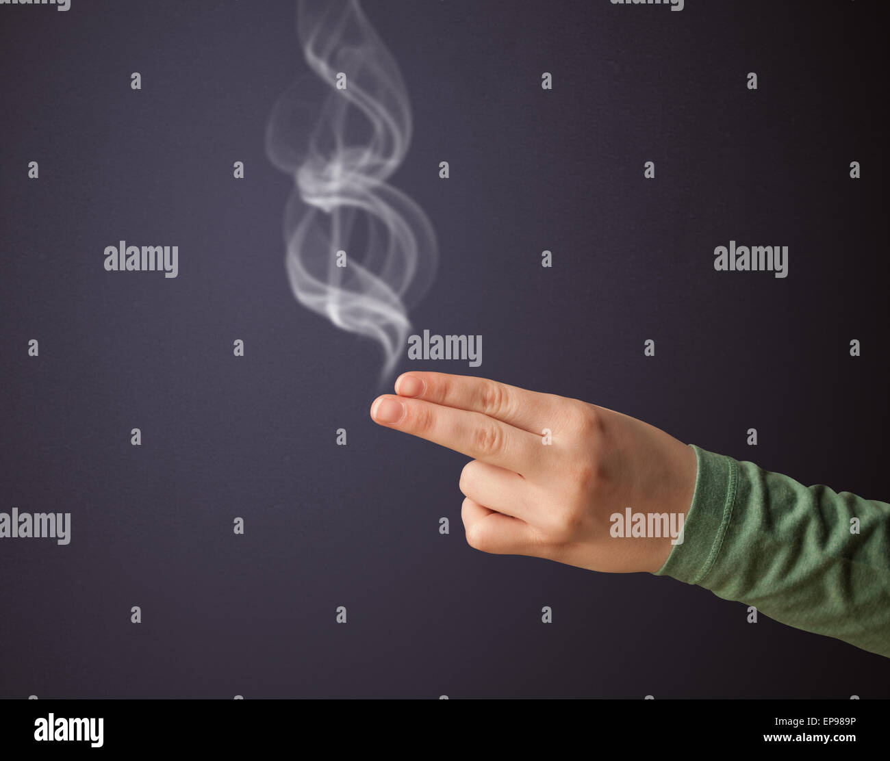 Gun shaped woman hand Stock Photo - Alamy