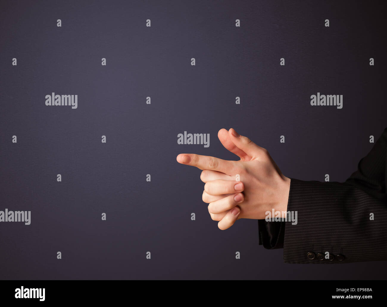 Gun shaped man hand Stock Photo - Alamy