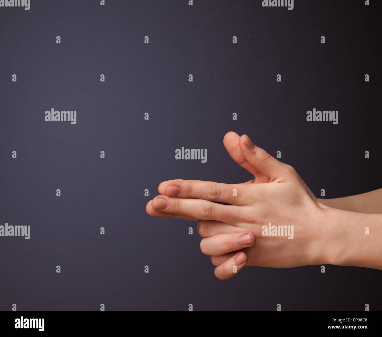 Gun shaped man hand Stock Photo - Alamy