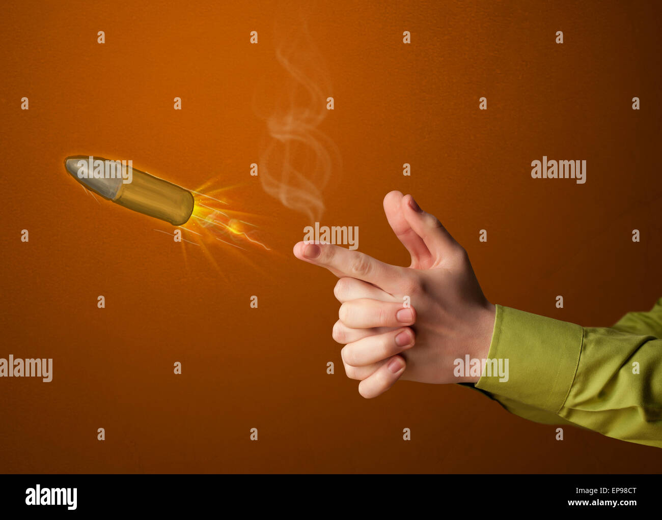 Gun shaped woman hand with bullet Stock Photo - Alamy